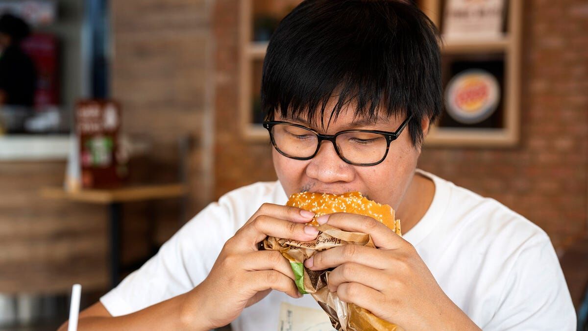 Man Biting Into Messy Sandwich Lets Out Little Whimper Of Capitulation ...