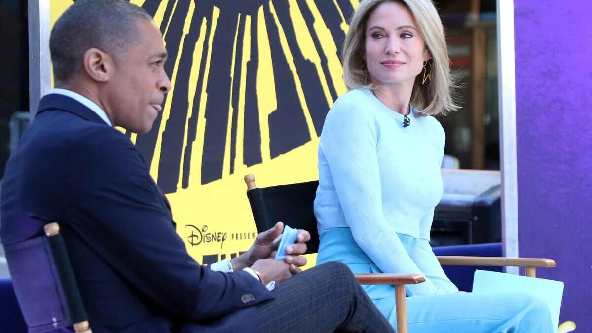 Amy Robach looks glum as she’s seen walking her dog with daughter Annie ...