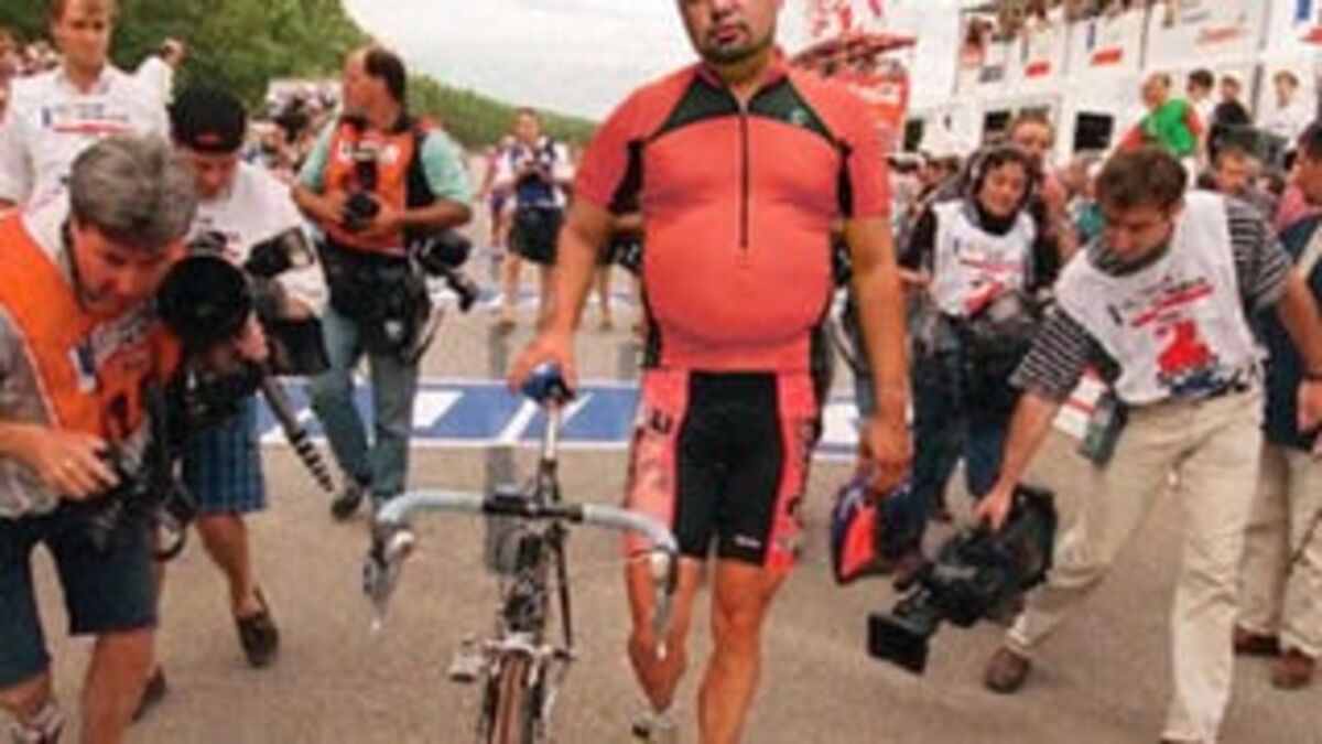 Overweight Cyclist Walking His Bike For Rest Of Tour De France