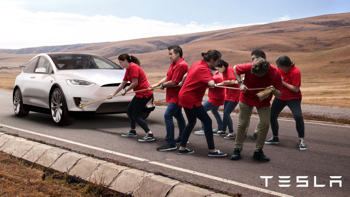 Elon Musk Unveils New Clean Energy Luxury Car Pulled By 8 Tesla Employees Elon Musk Unveils New Clean Energy Luxury Car Pulled By 8 Tesla Employees