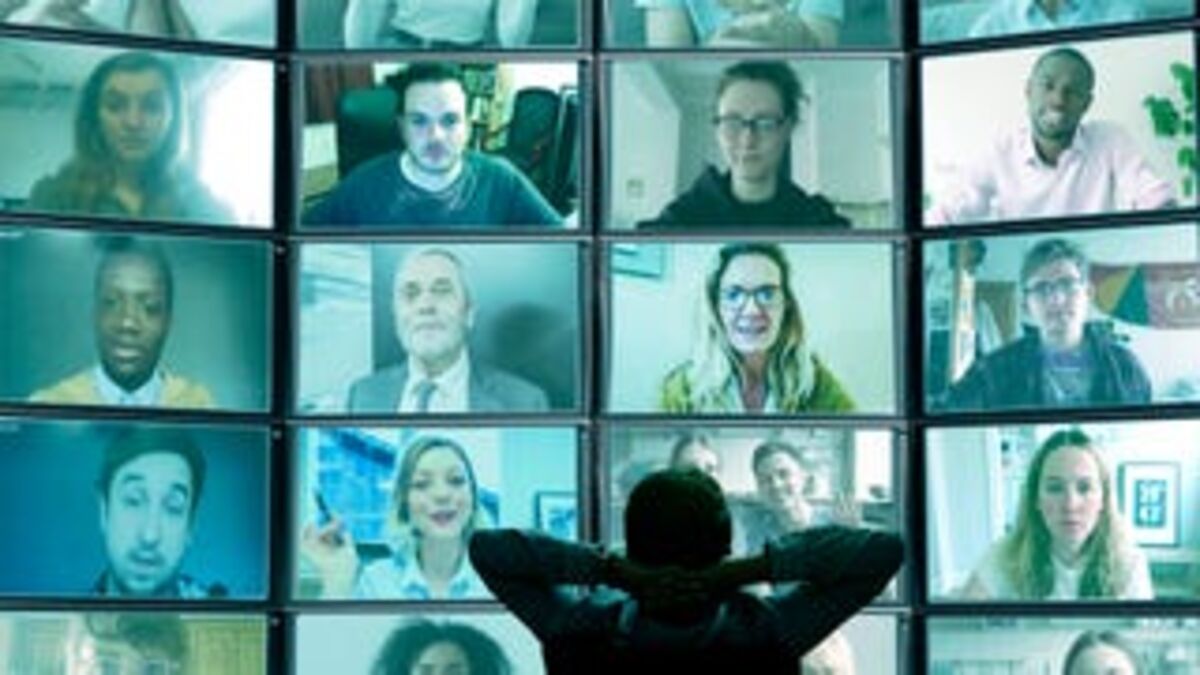 Zoom CEO Reclines Back In Chair In Front Of Massive Wall Of Screens ...