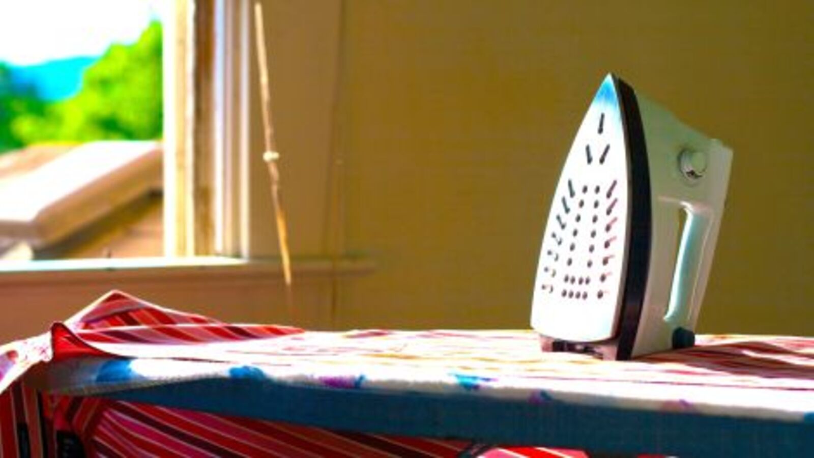 Keep Your Clothes From Wearing Out by Ironing Instead of Washing