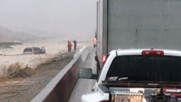 Rescuers Swept Away As Flash Flood Engulfs Highway Rescuers Swept Away As Flash Flood Engulfs Highway