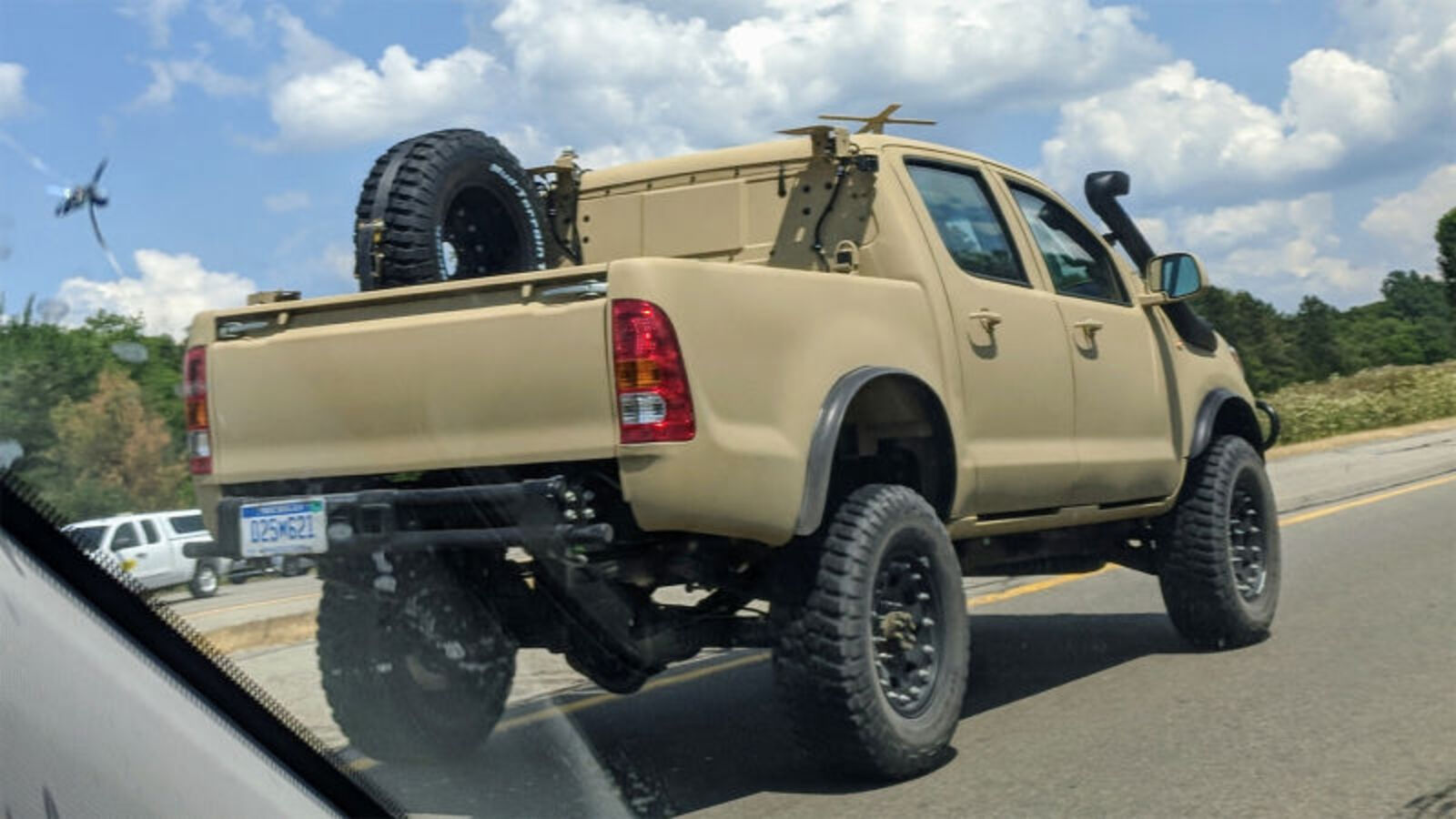Check Out This Militarized Toyota Hilux and Its Weird Door Handles
