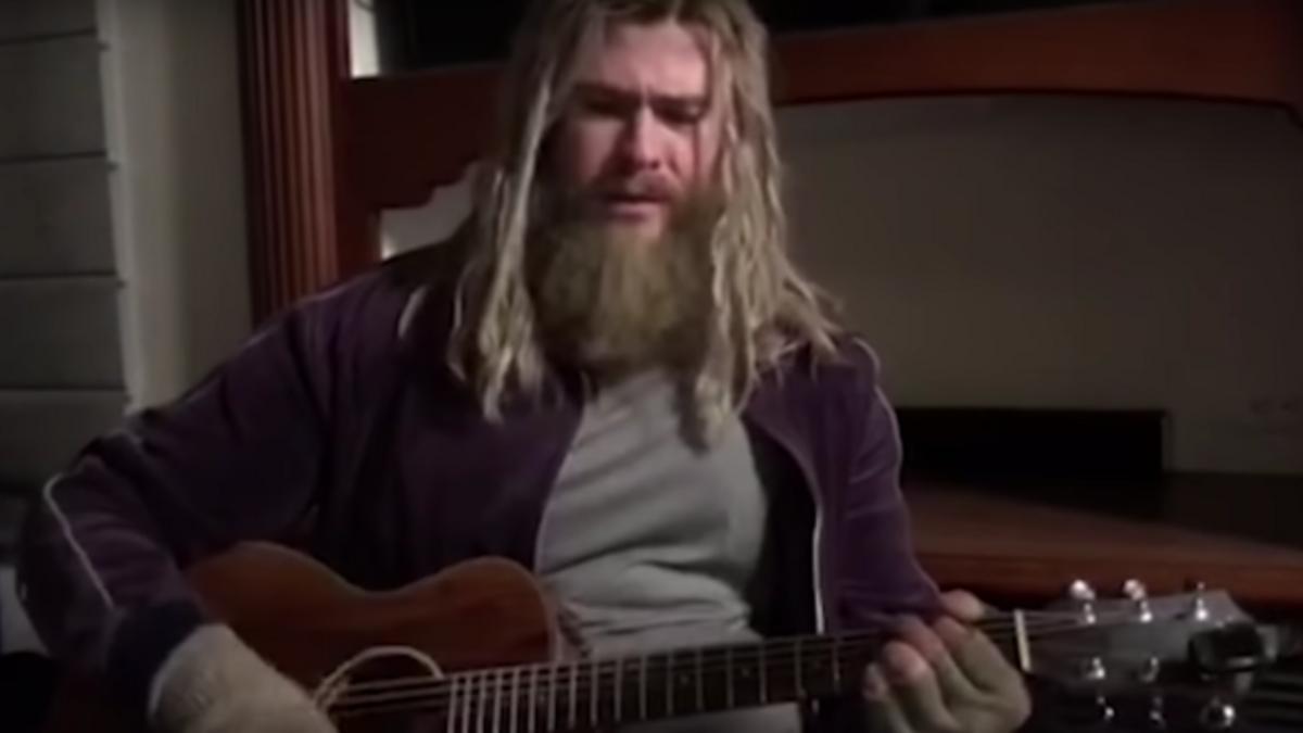 Watch Chris Hemsworth’s bloated Thor sing “Hurt”