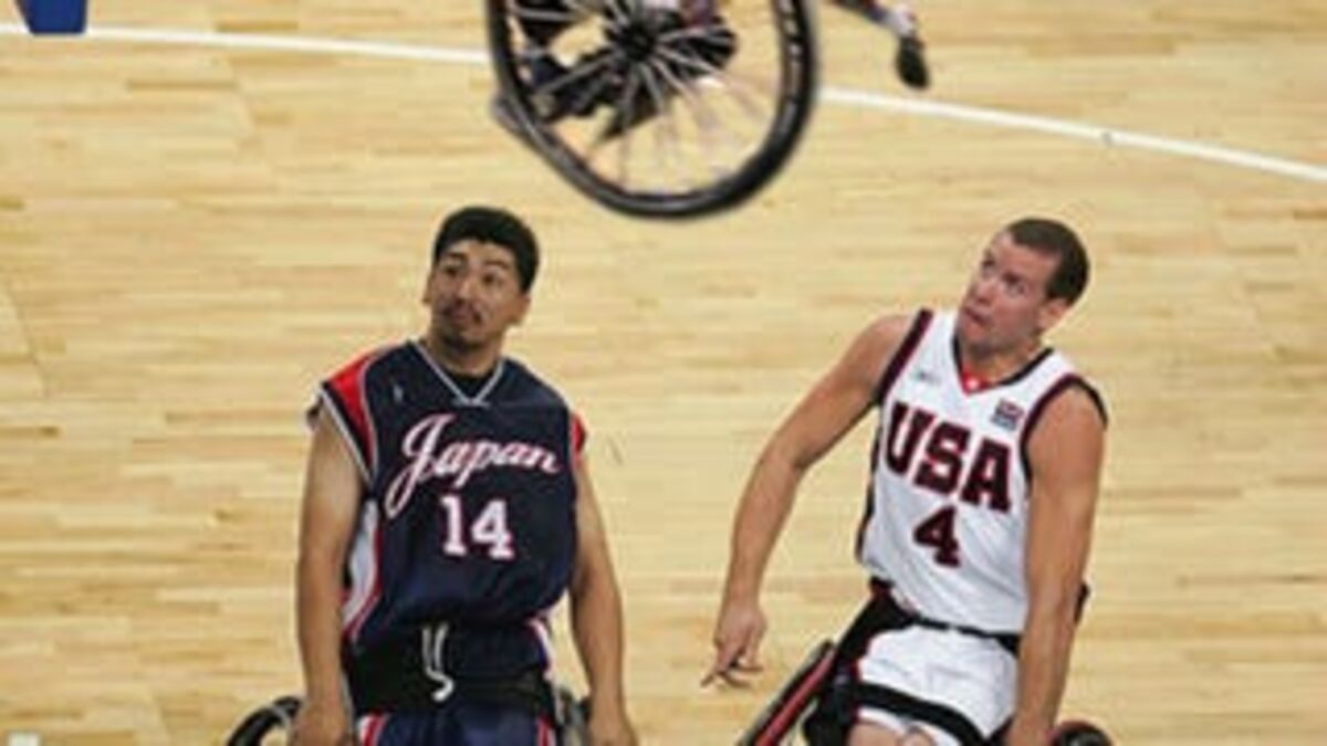 Wheelchair-Basketball Players Stunned By Thunderous Slam Dunk